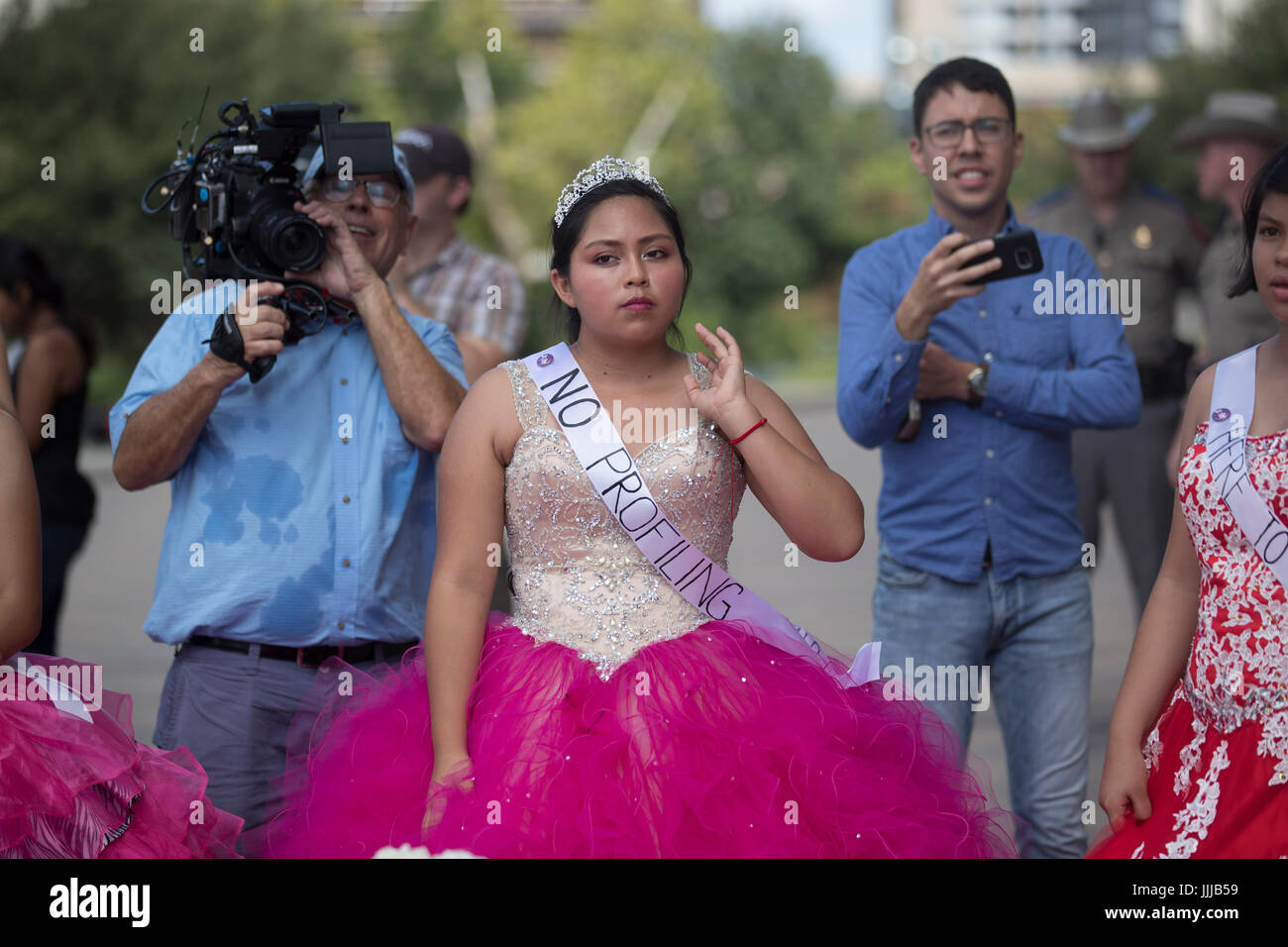 Teen girls wearing Mexican-style quinceanera dresses at the Texas ...
