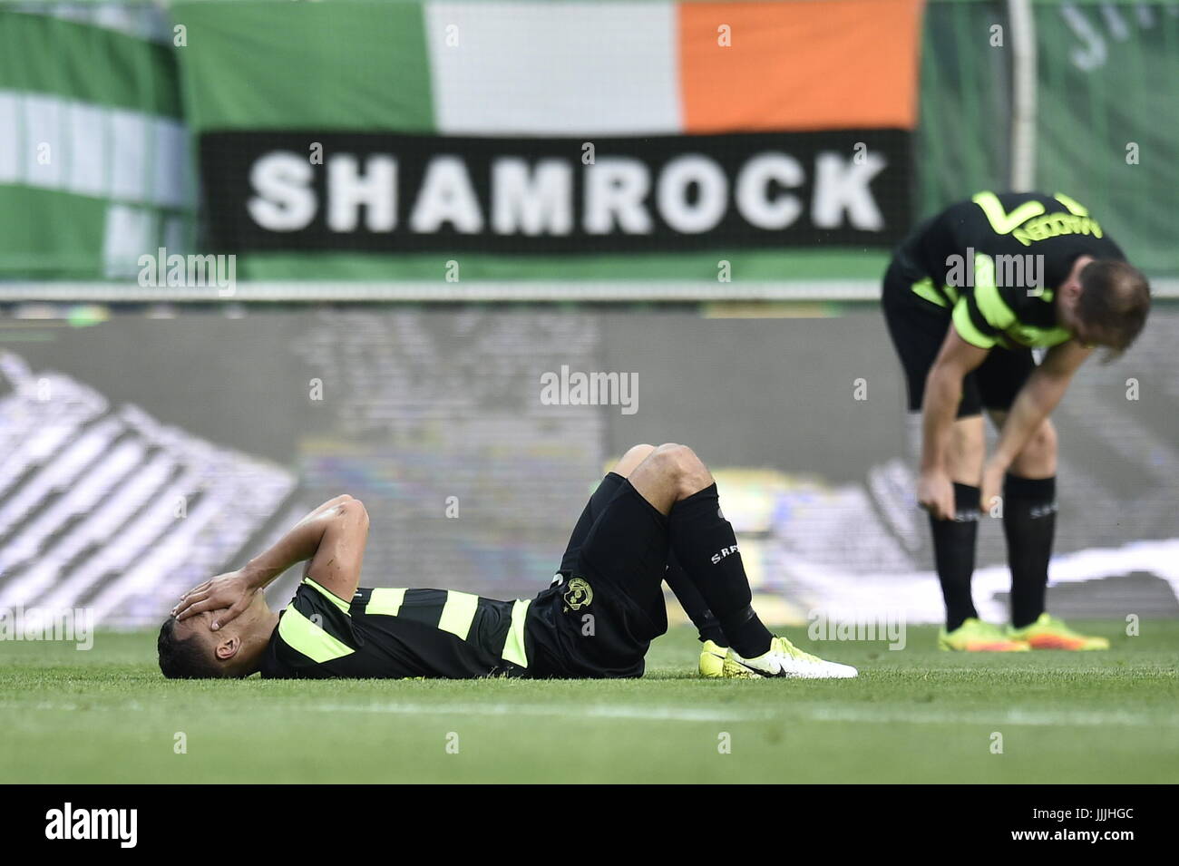 Graham Burke (Shamrock), left, after the lost match, the 2nd qualifying ...