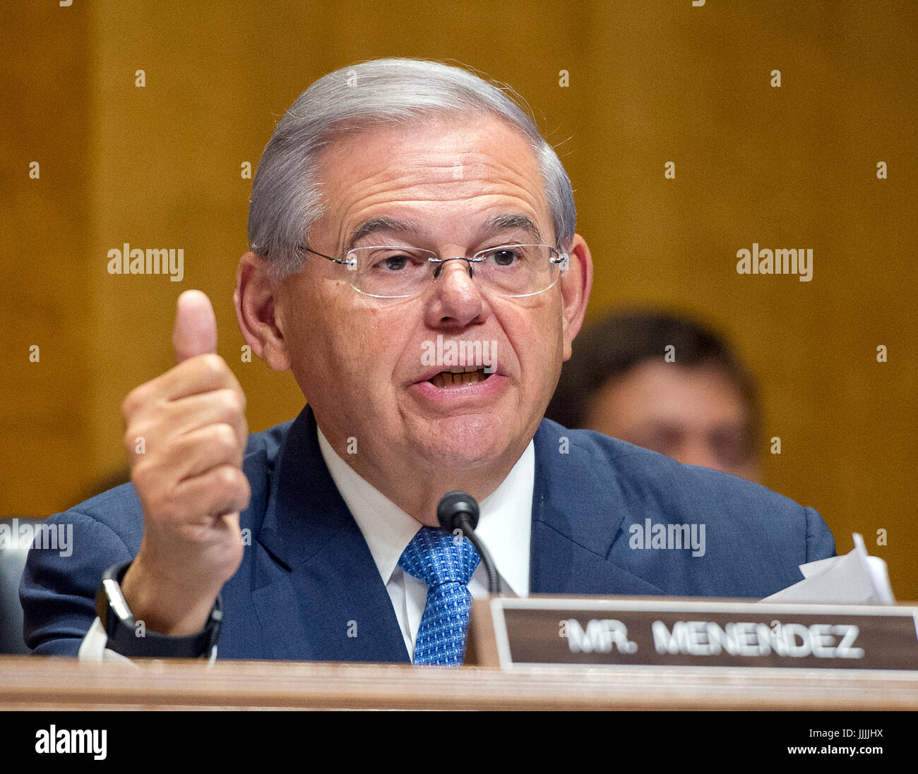 United States Senator Robert Menendez (Democrat of New Jersey) questions one of the witnesses as ...