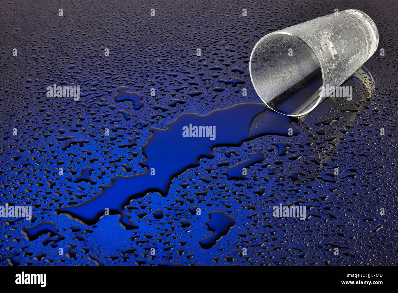 Water spilled on dark hi-res stock photography and images - Alamy