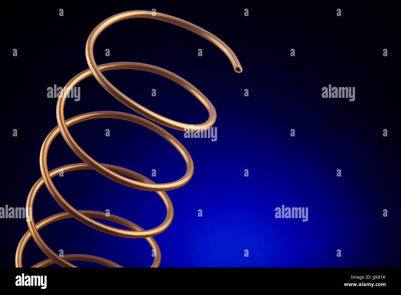 Spiral of copper wire on metal surface abstract industry Stock Photo ...