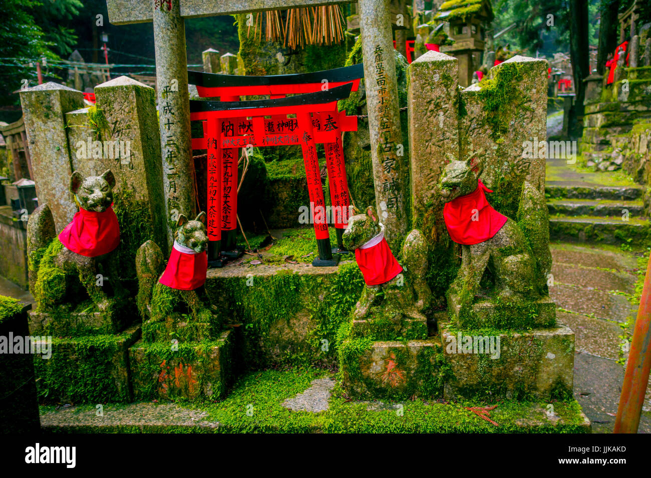 KYOTO, JAPAN - JULY 05, 2017: Fox stone statue at Fushimi Inari Shrine ...