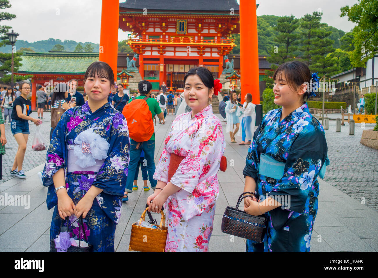 KYOTO JAPAN - NOVEMBER 24, 2016: Young women visiting a fushimi inari ...