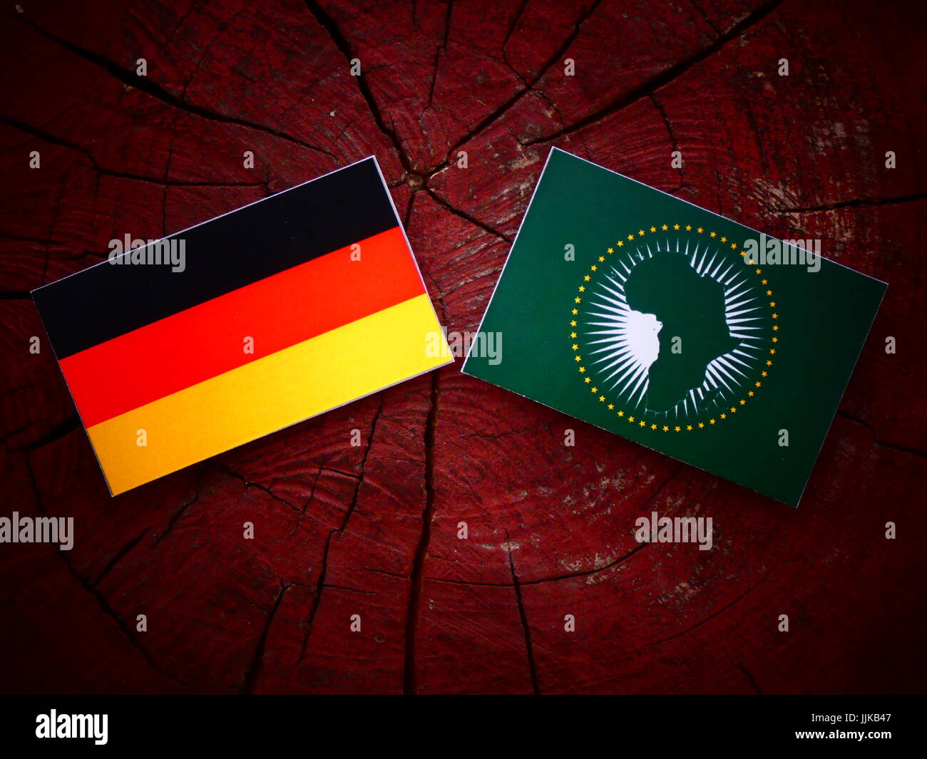 German flag with African Union flag on a tree stump isolated Stock ...