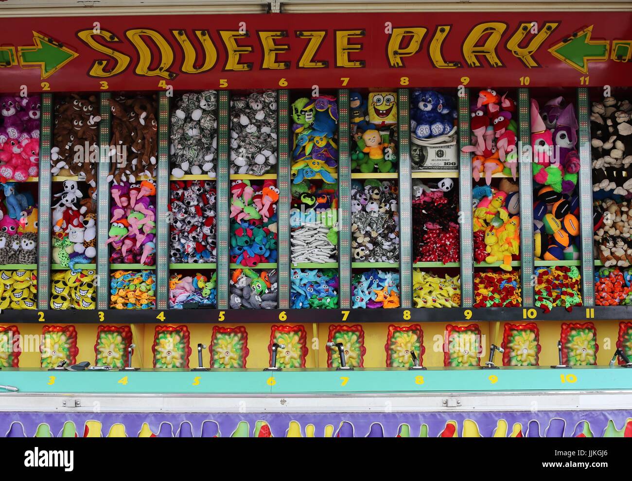 Colorful prizes at a carnival game at the Rice County fair in Faribault ...