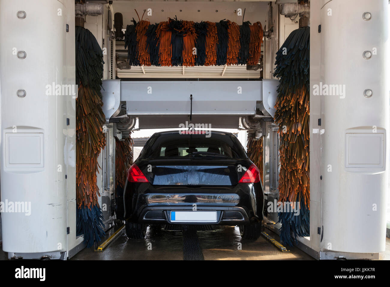 Car being washed in an automatic vehicle wash service station Stock ...