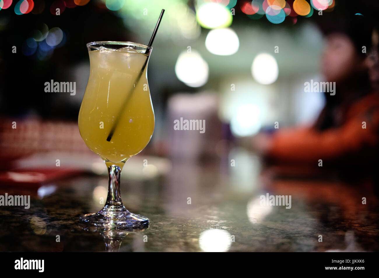 Single cocktail drink in restaurant Stock Photo - Alamy