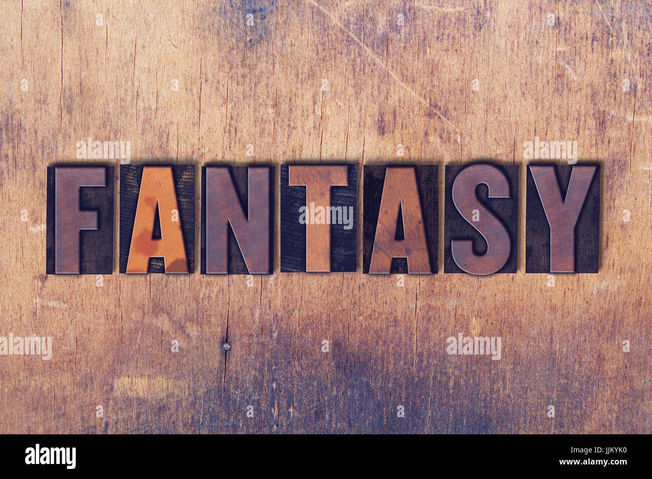 The word Fantasy concept and theme written in vintage wooden ...