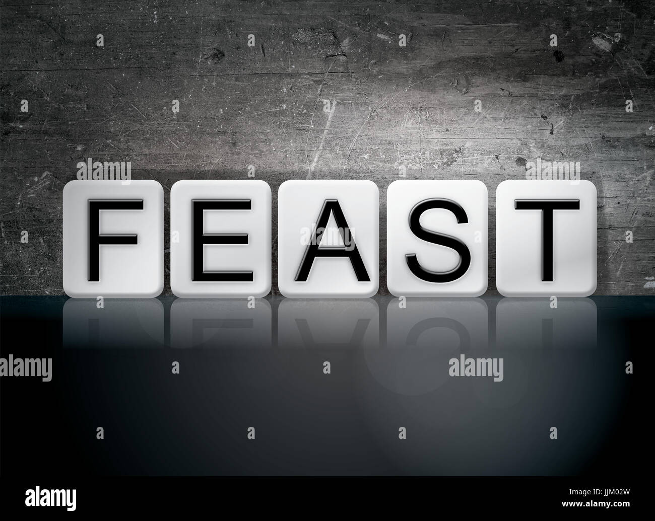 The word Feast concept and theme written in white tiles on a dark ...