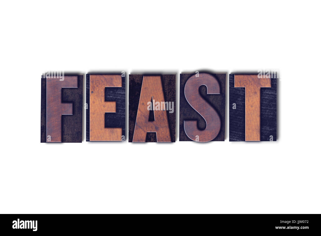 The word Feast concept and theme written in vintage wooden letterpress ...