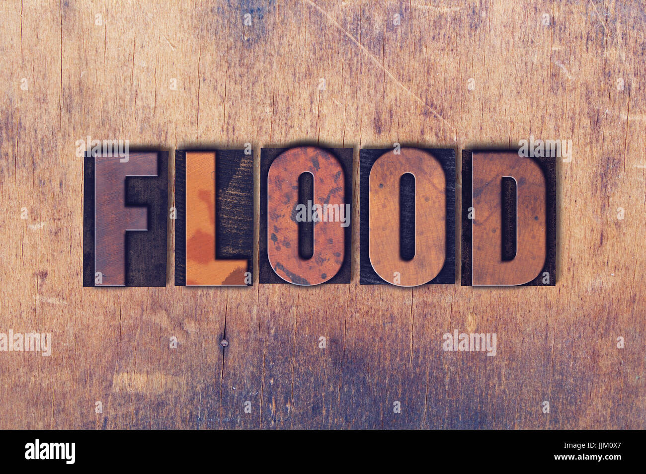 The word Flood concept and theme written in vintage wooden letterpress ...