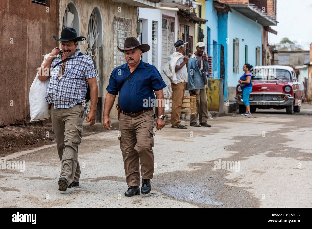 COWBOYS walk through town- TRINIDAD, CUBA Stock Photo - Alamy