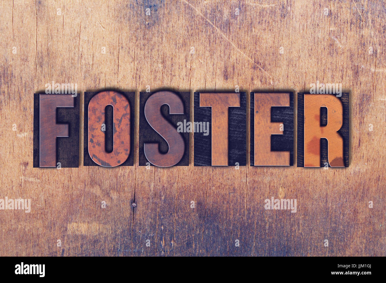 The word Foster concept and theme written in vintage wooden letterpress ...