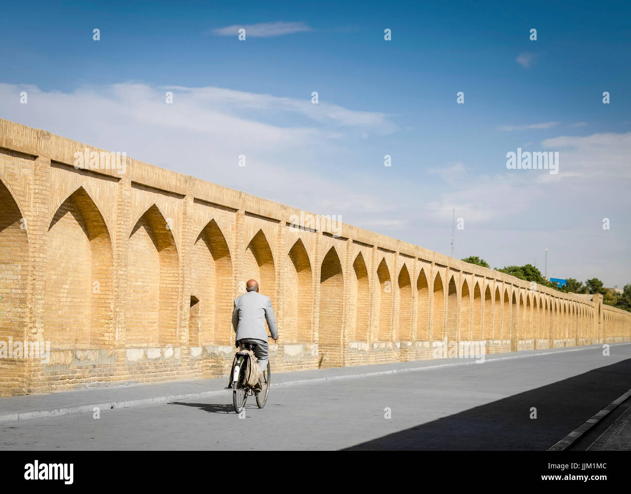 Cyclist on Siosepol bridge, Isfahan, Iran Stock Photo - Alamy