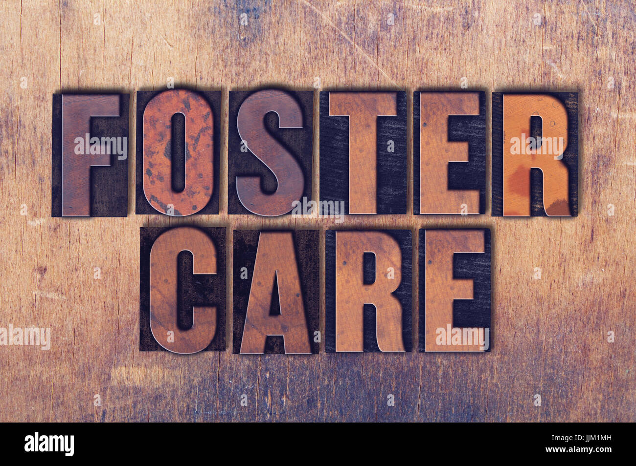 The words Foster Care concept and theme written in vintage wooden ...
