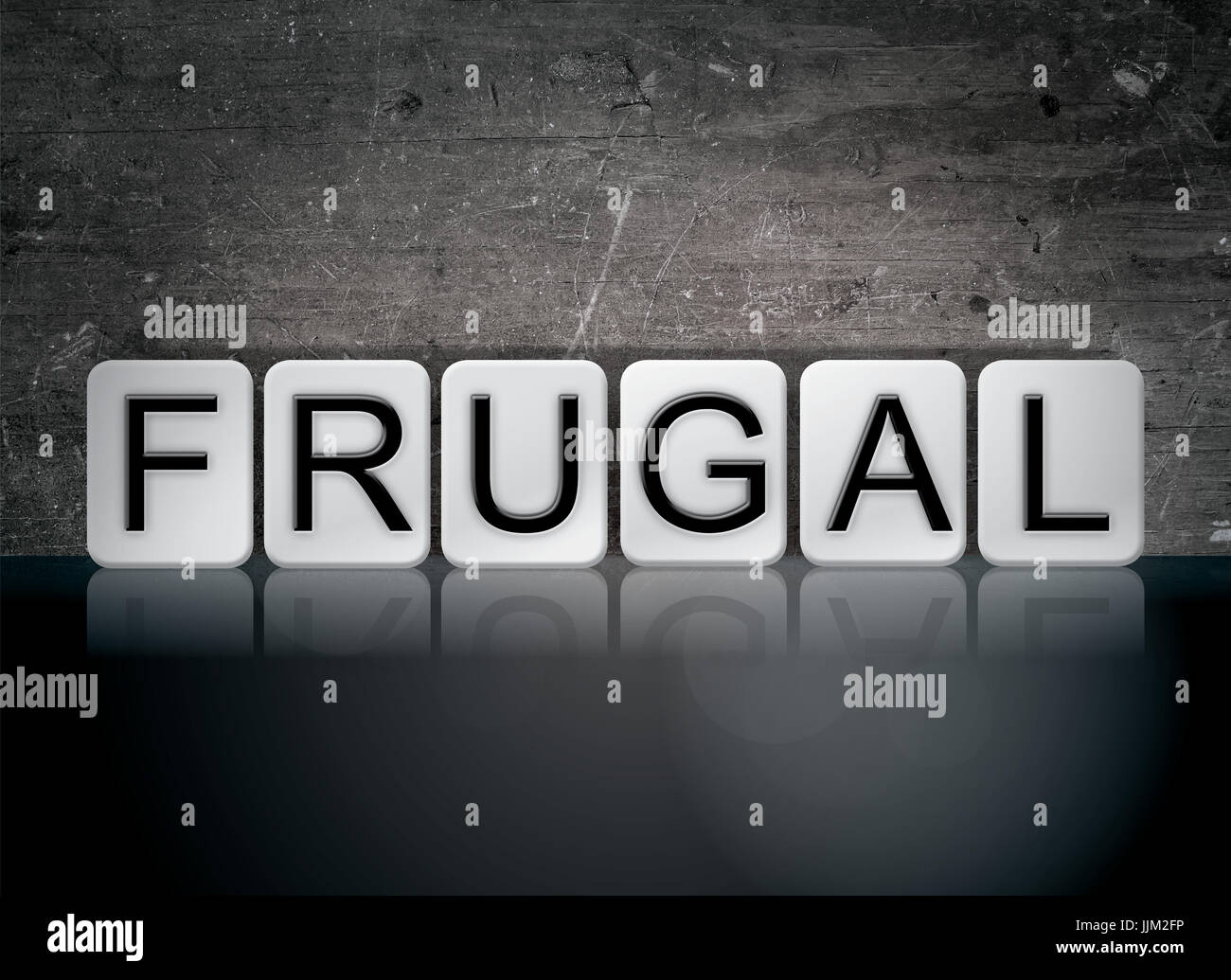The word Frugal concept and theme written in white tiles on a dark ...