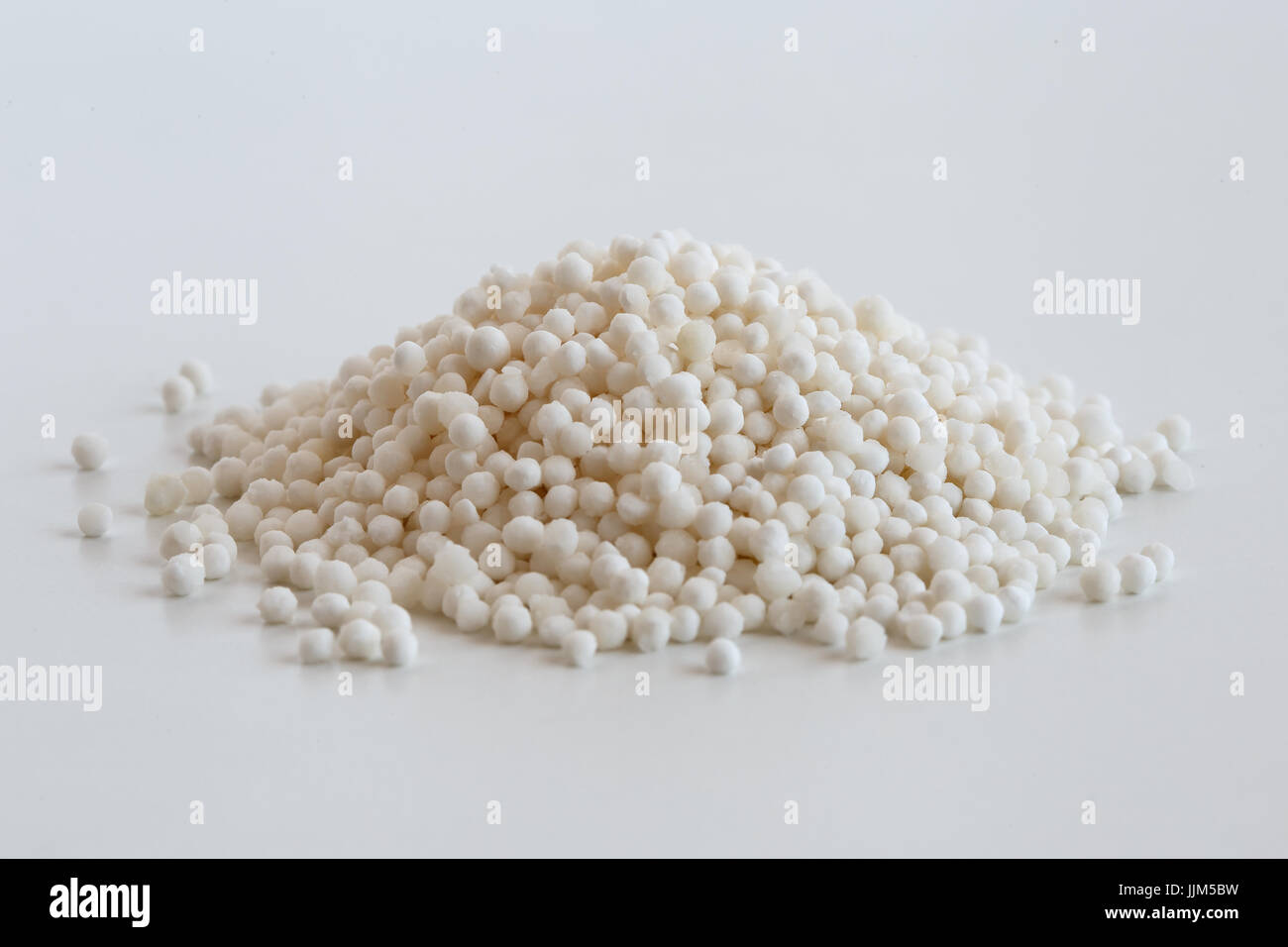 Heap of dry tapioca pearls isolated on white Stock Photo - Alamy