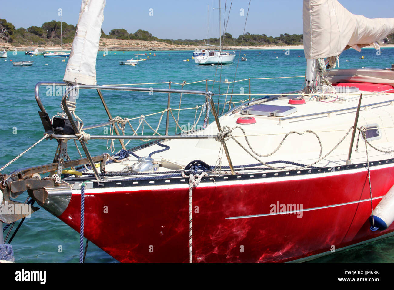 red boat in the harbour Stock Photo - Alamy