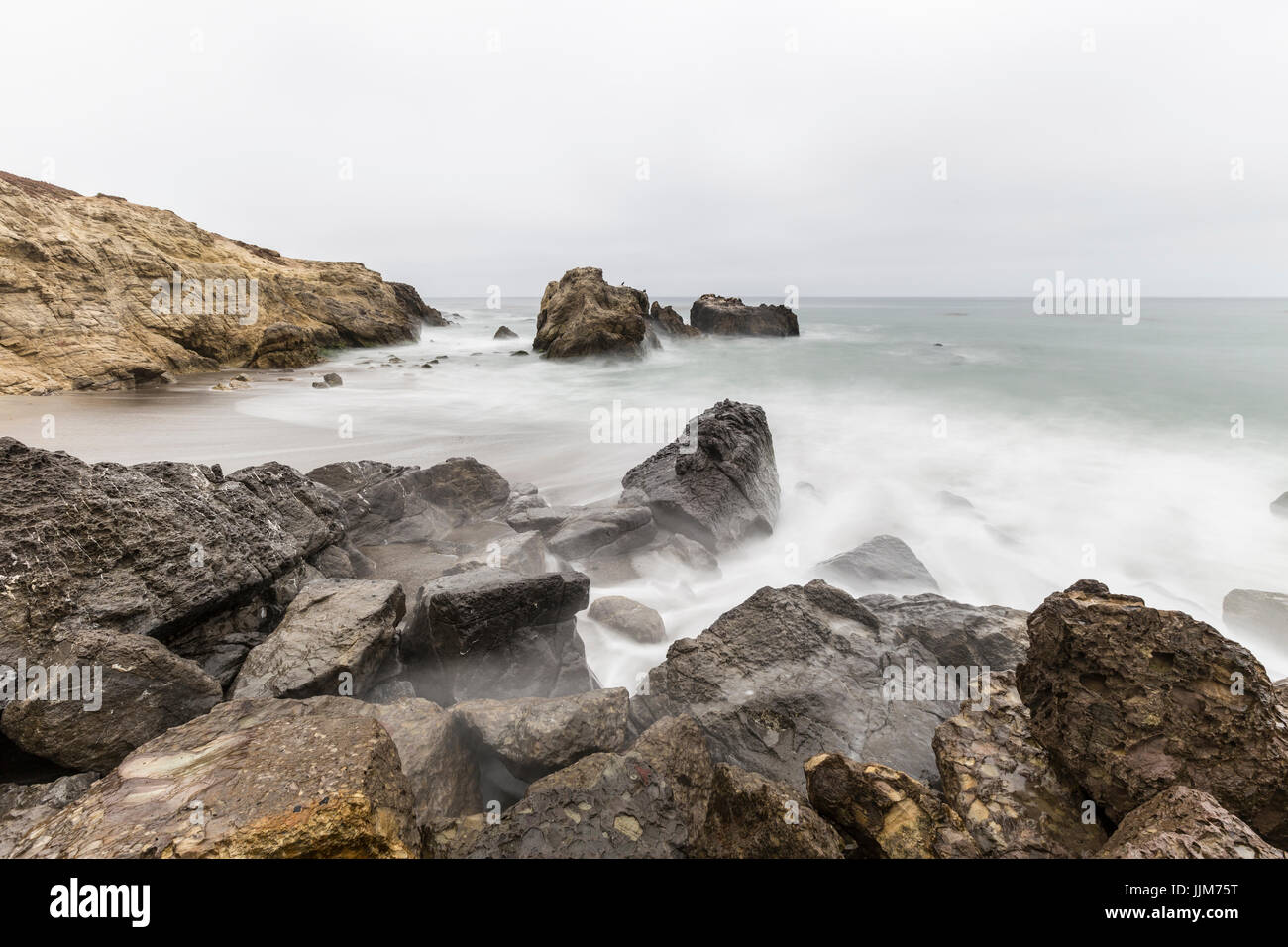 Rocky Leo Carrillo State Beach with motion blur water in Malibu ...