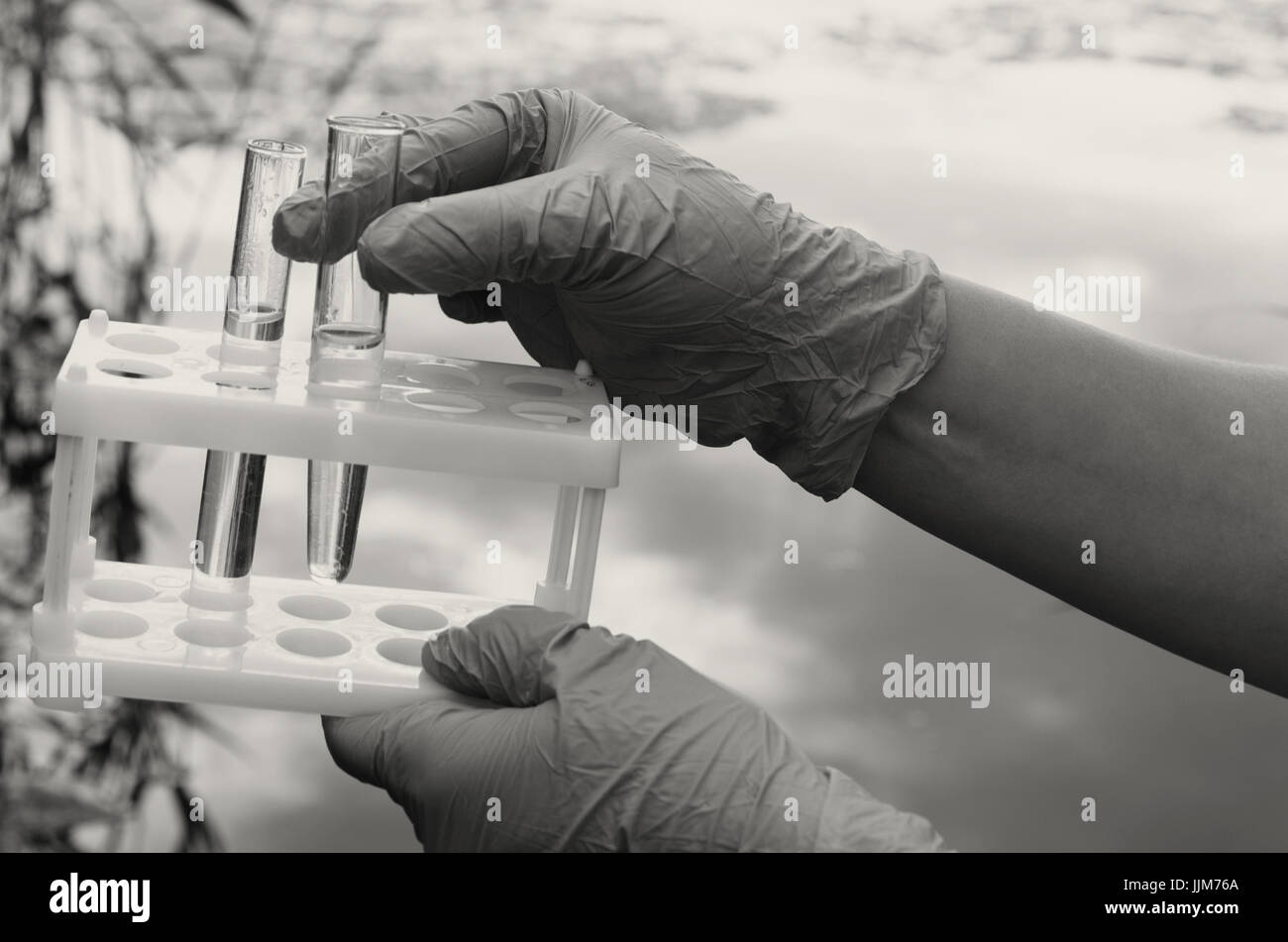 Taking a water test for analysis from a reservoir Stock Photo - Alamy