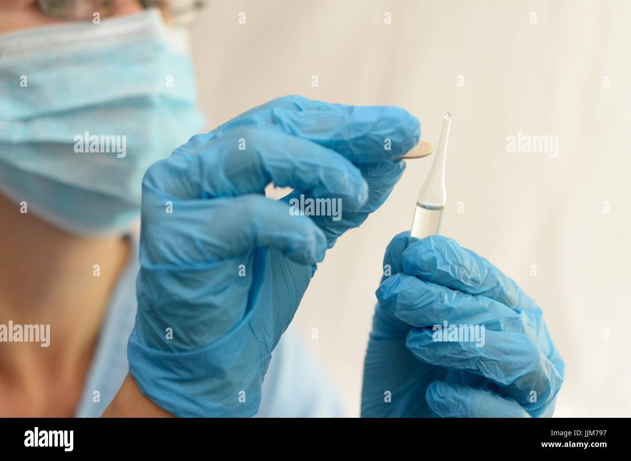 Doctor makes tests hi-res stock photography and images - Alamy
