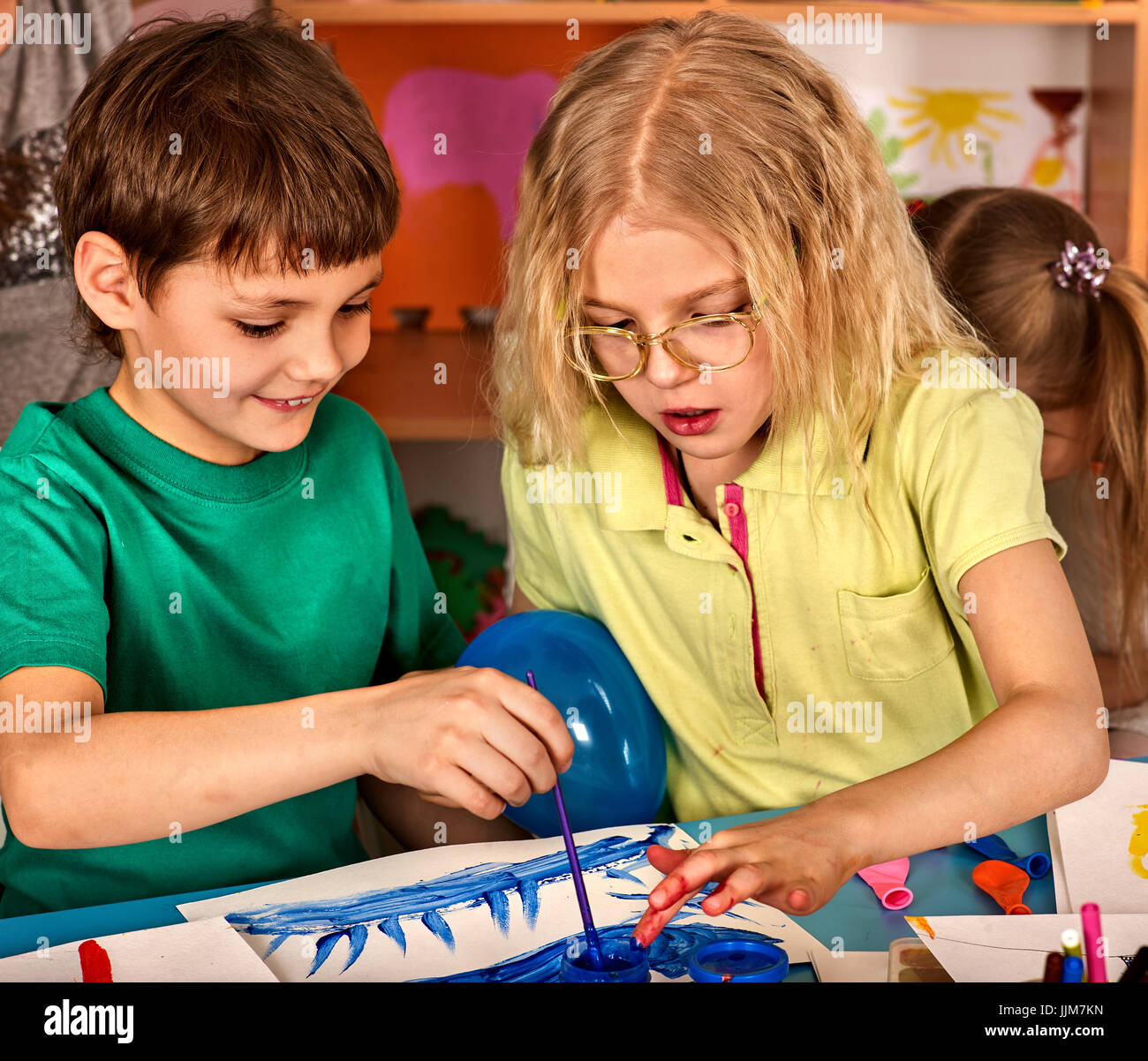 Small students children painting in art school class Stock Photo - Alamy