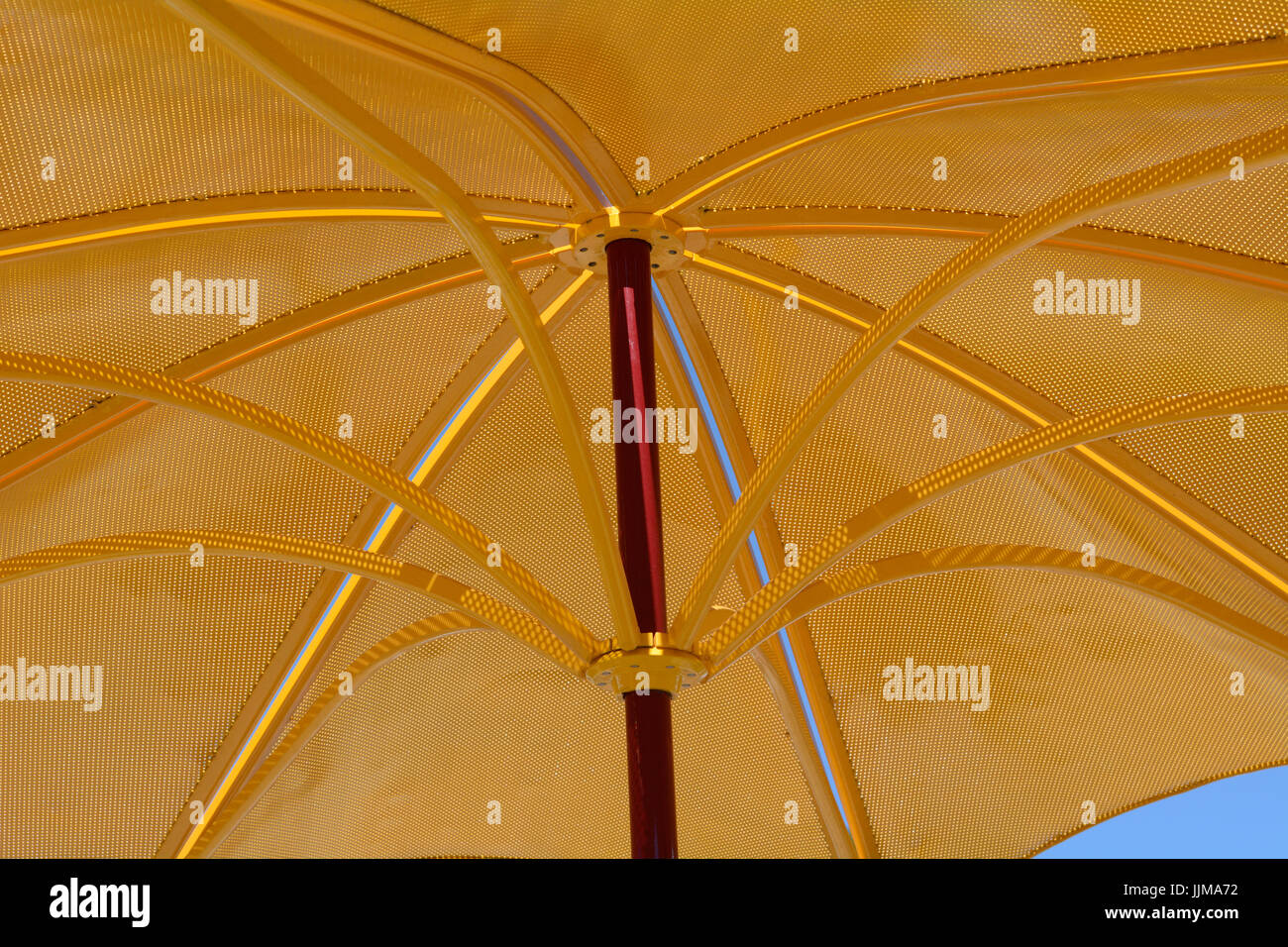 Golden metal parasol umbrella for ultraviolet light protection and ...