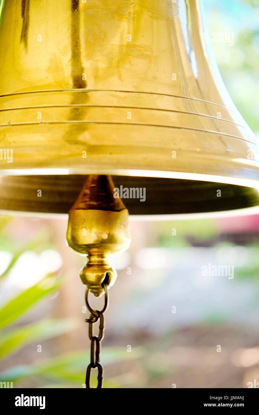 Golden bell in trainstation Stock Photo - Alamy