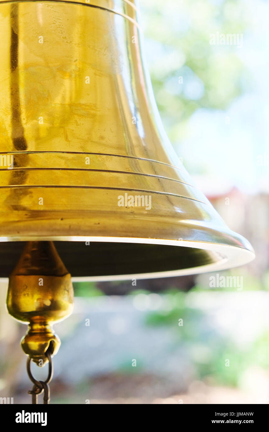 Golden bell in trainstation Stock Photo - Alamy