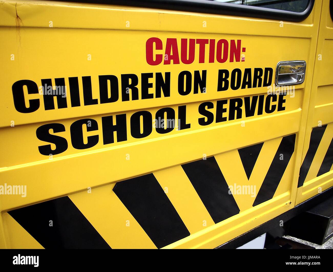 Photo of a school bus door with sign Stock Photo - Alamy