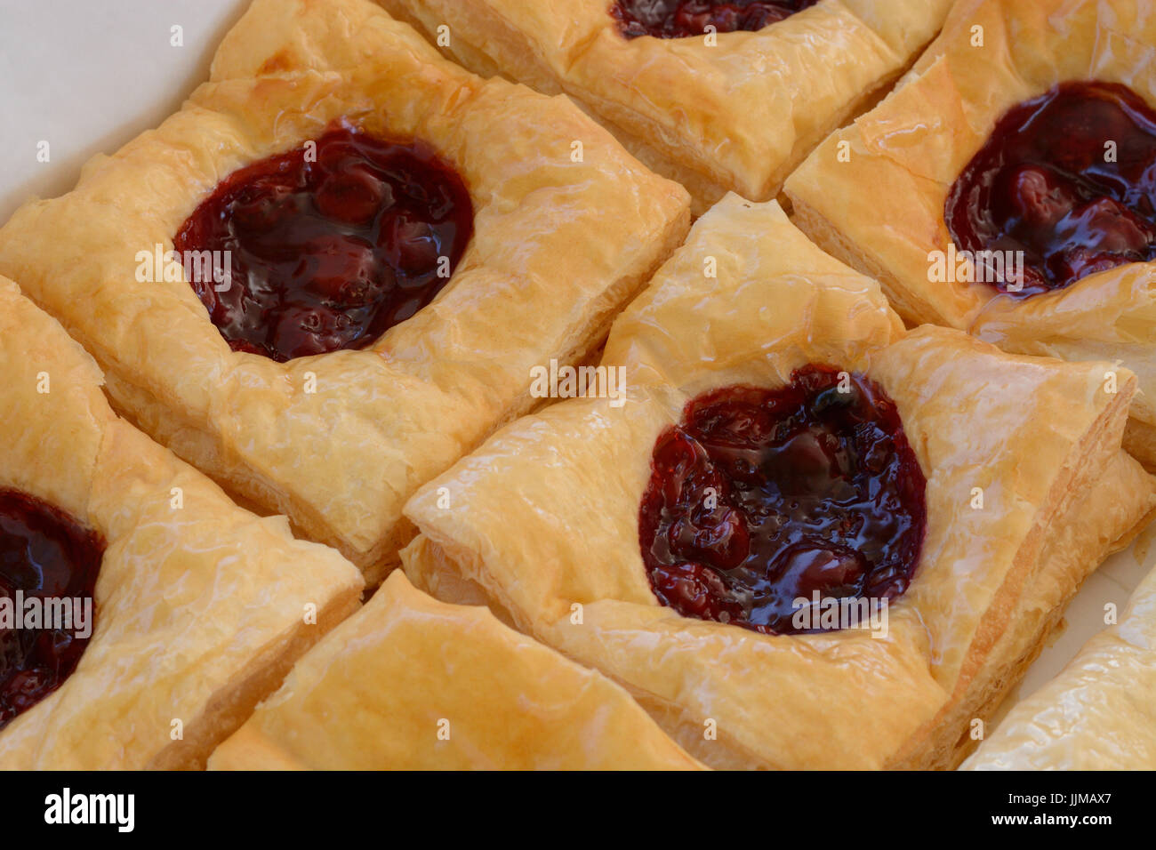 Close up of cherry strudel in white bakery box Stock Photo - Alamy
