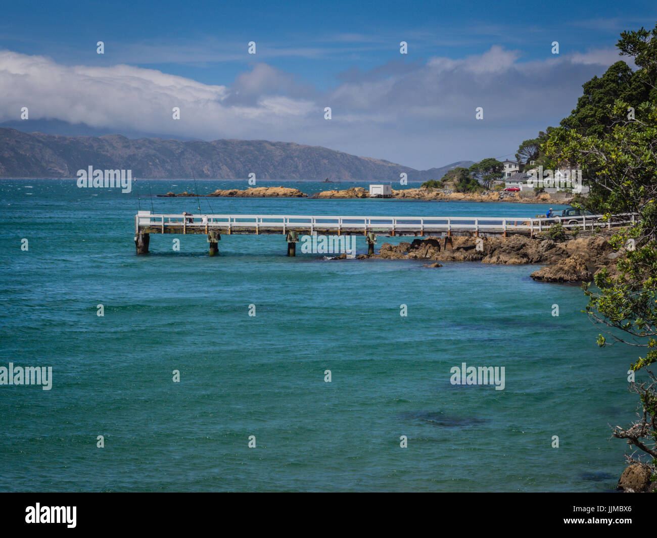 Jetty Into The Harbour Stock Photo - Alamy