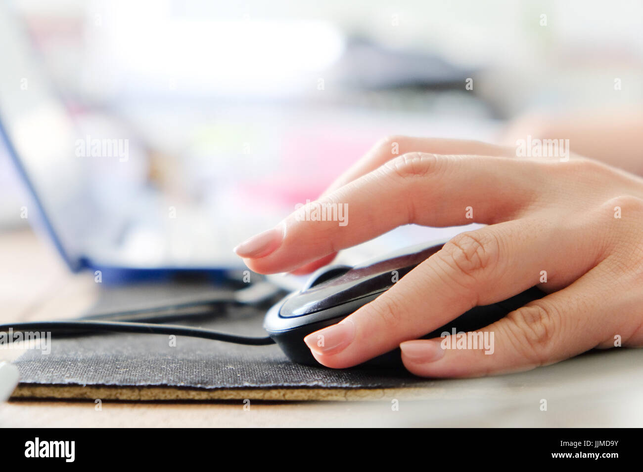 woman hand using a computer mouse, working time Stock Photo - Alamy