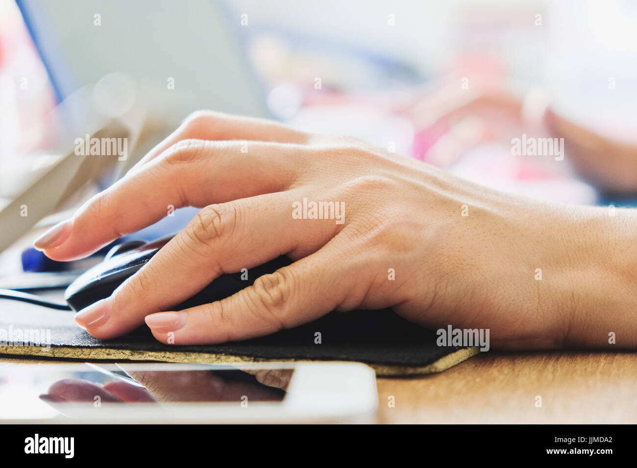 woman hand using a computer mouse, working time Stock Photo - Alamy