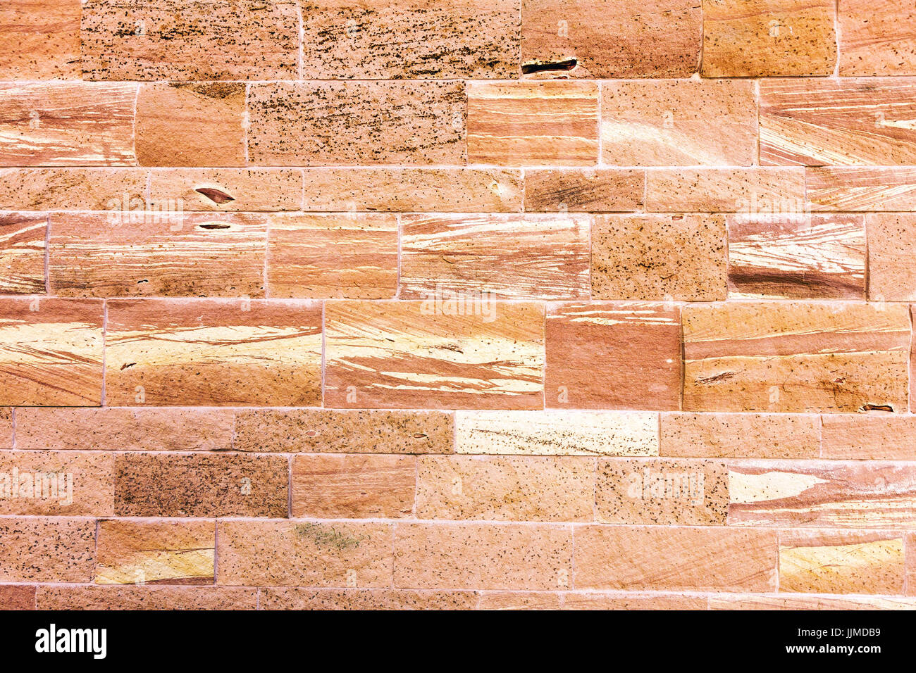 Textured red stone wall as perfect background Stock Photo - Alamy