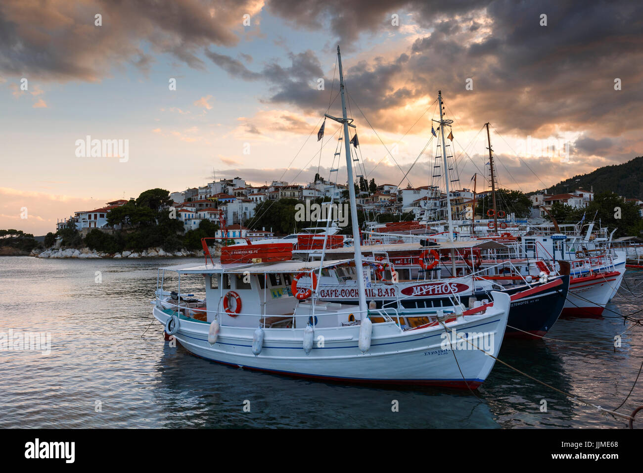 Evening view of the harbour on Skiathos island, Greece Stock Photo - Alamy