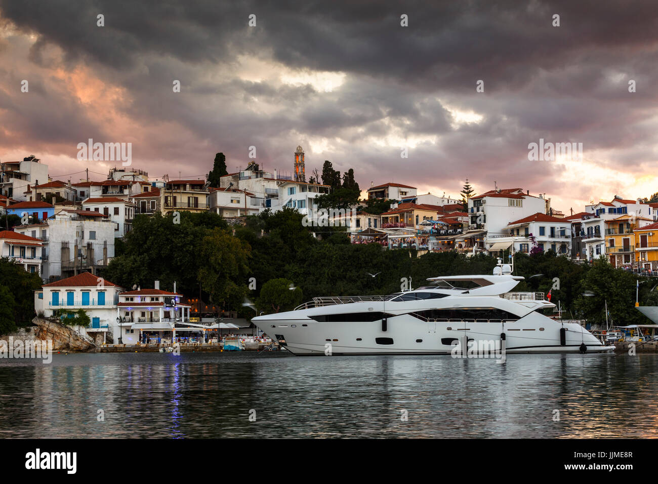 Evening view of the harbour on Skiathos island, Greece Stock Photo - Alamy