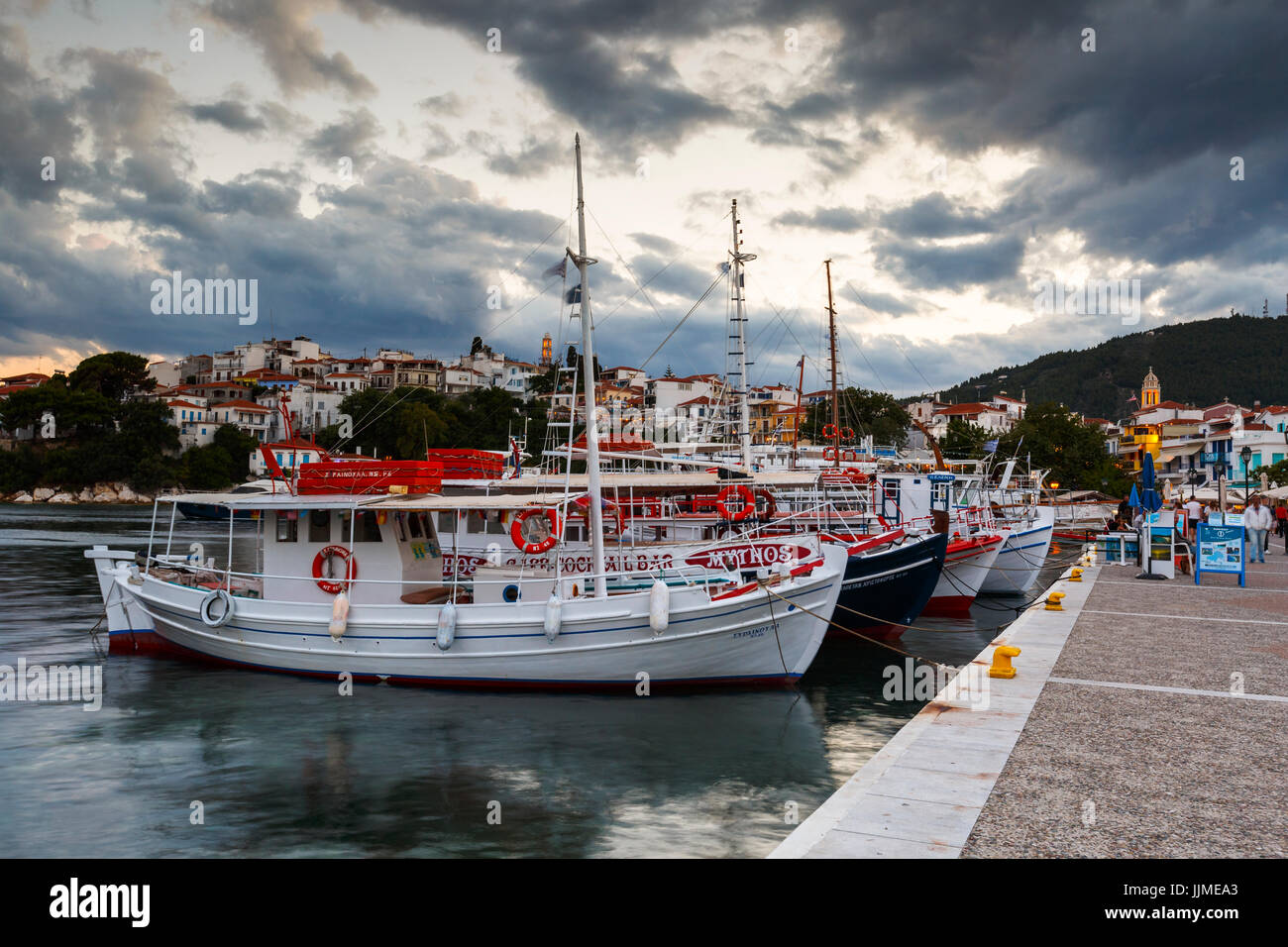Evening view of the harbour on Skiathos island, Greece Stock Photo - Alamy