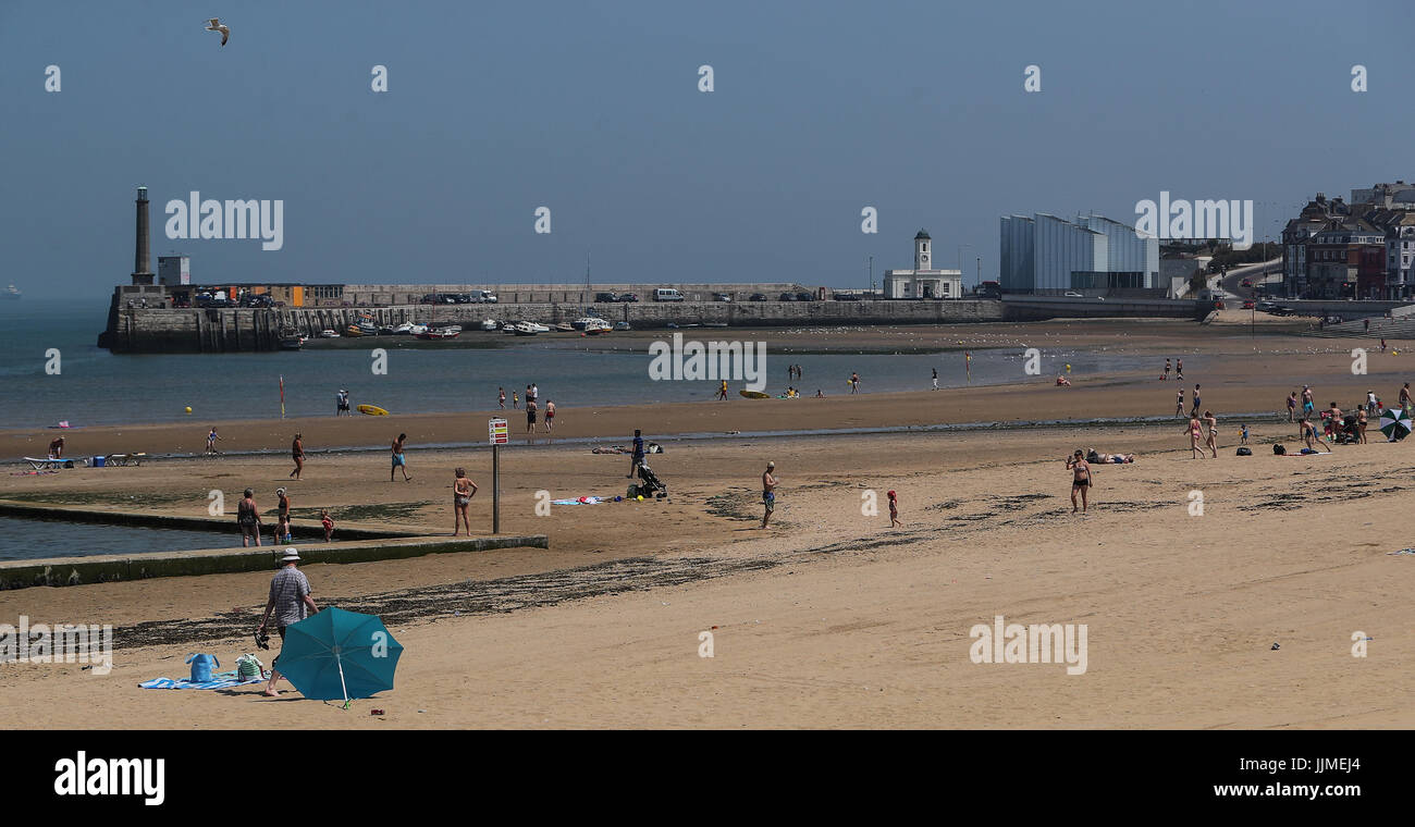 People take advantage of the hot summer weather on the beach in Margate ...