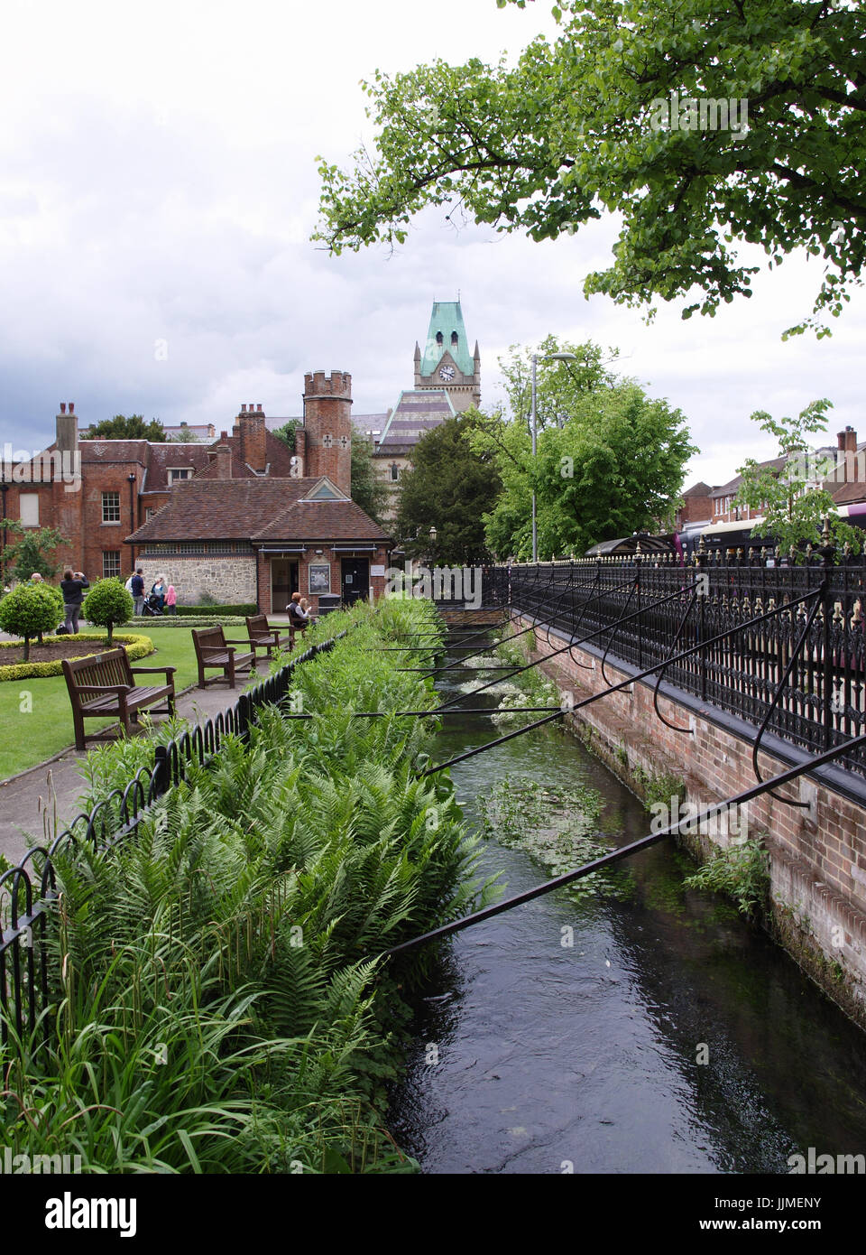 Stream flowing through Abbey Gardens, Winchester, Hampshire, England UK ...