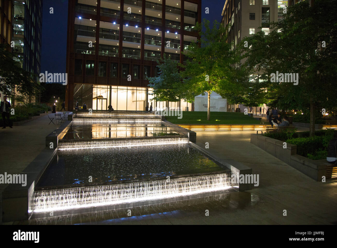 Pancras Square at night, north of King's Cross Station with water ...
