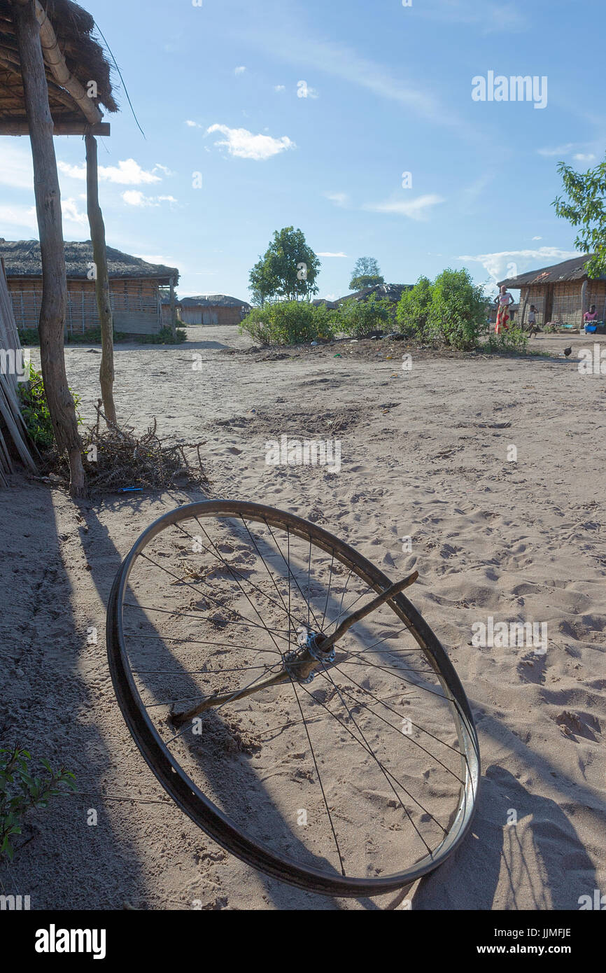Traditional toy of African children. Bicycle wheel Stock Photo - Alamy