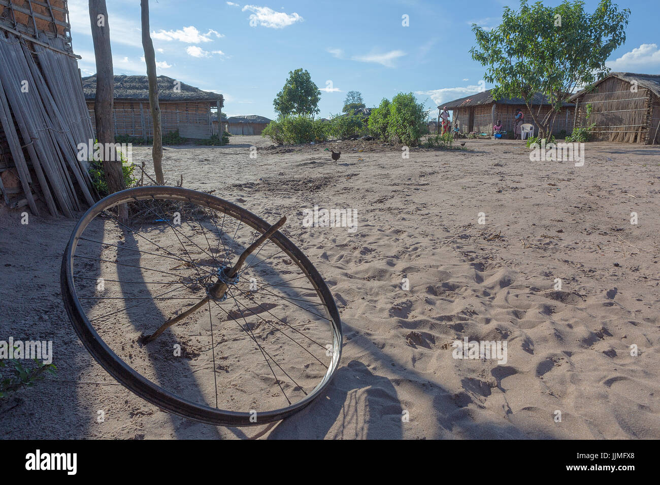 Traditional toy of African children. Bicycle wheel Stock Photo - Alamy