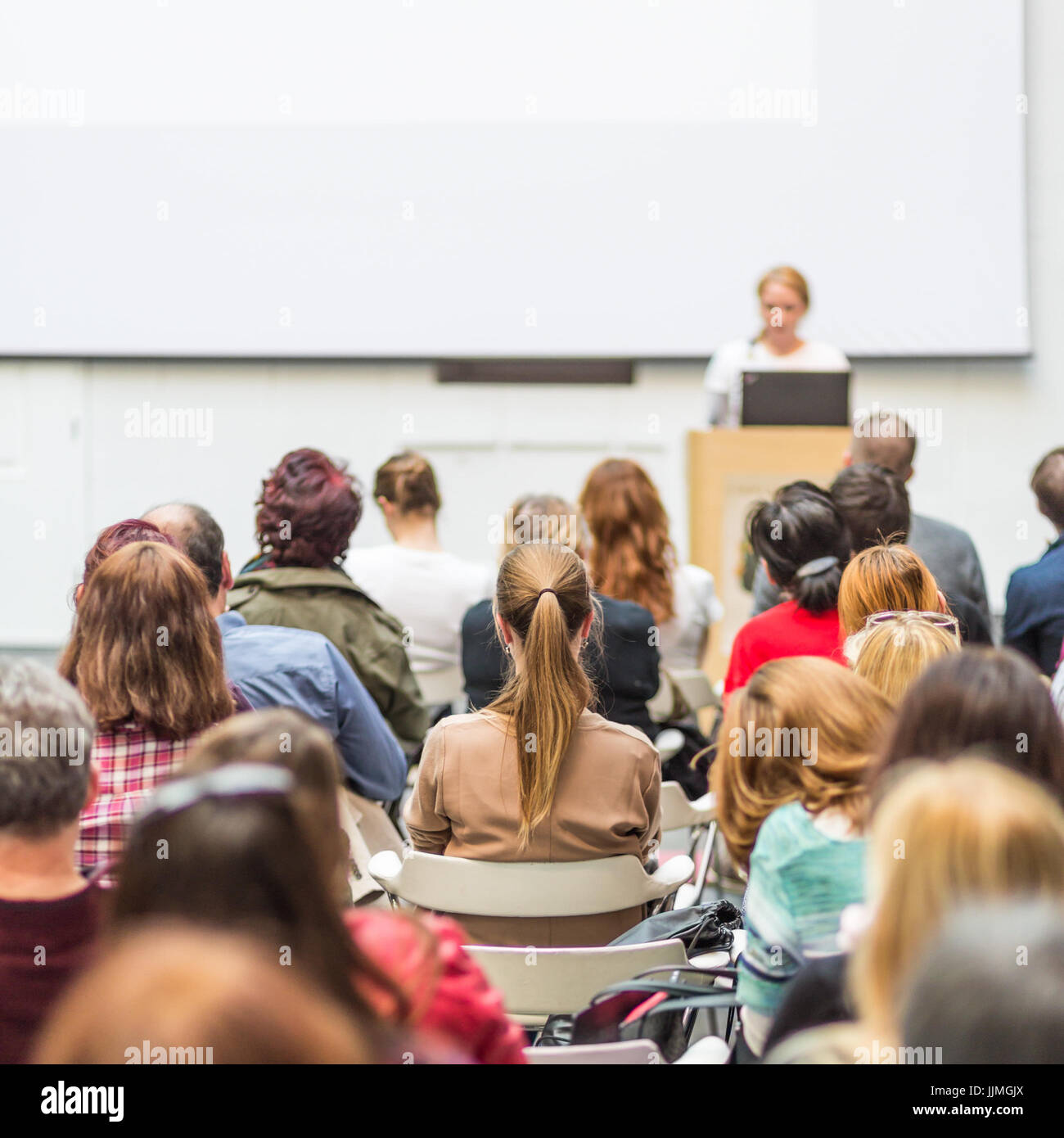 Female speech in meeting hall hi-res stock photography and images - Alamy