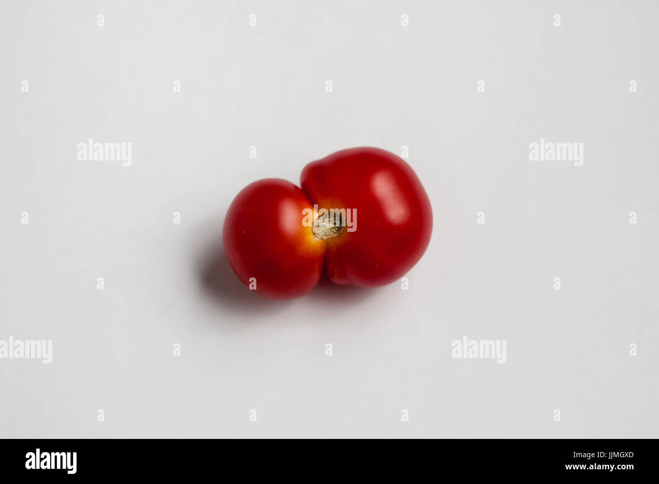 deformed sweet tomato Stock Photo - Alamy