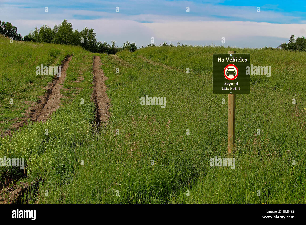 No vehicles beyond this point sign with a road in the background Stock ...