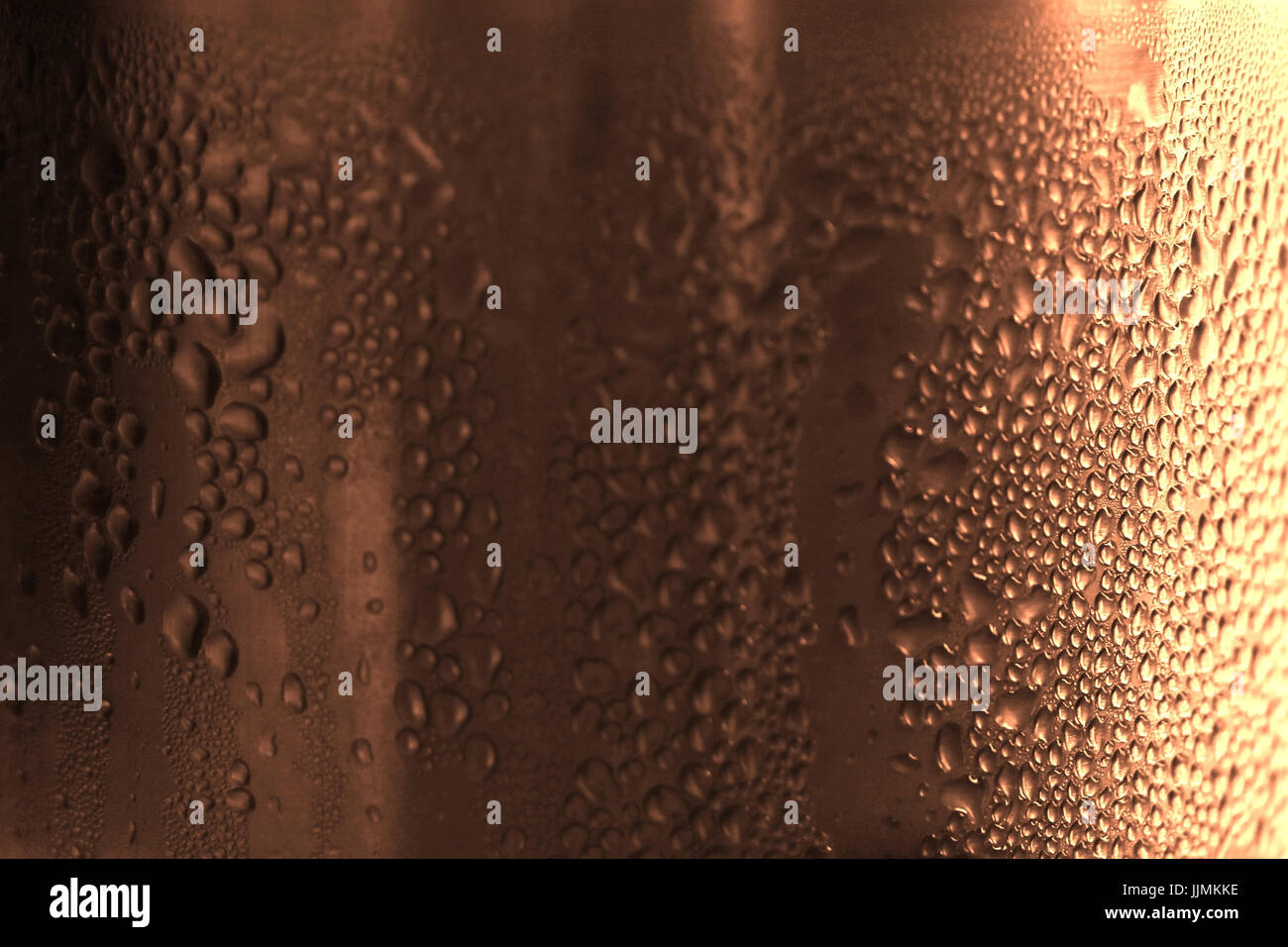 water drop from cool water in stainless cup,closed up at water drop ...