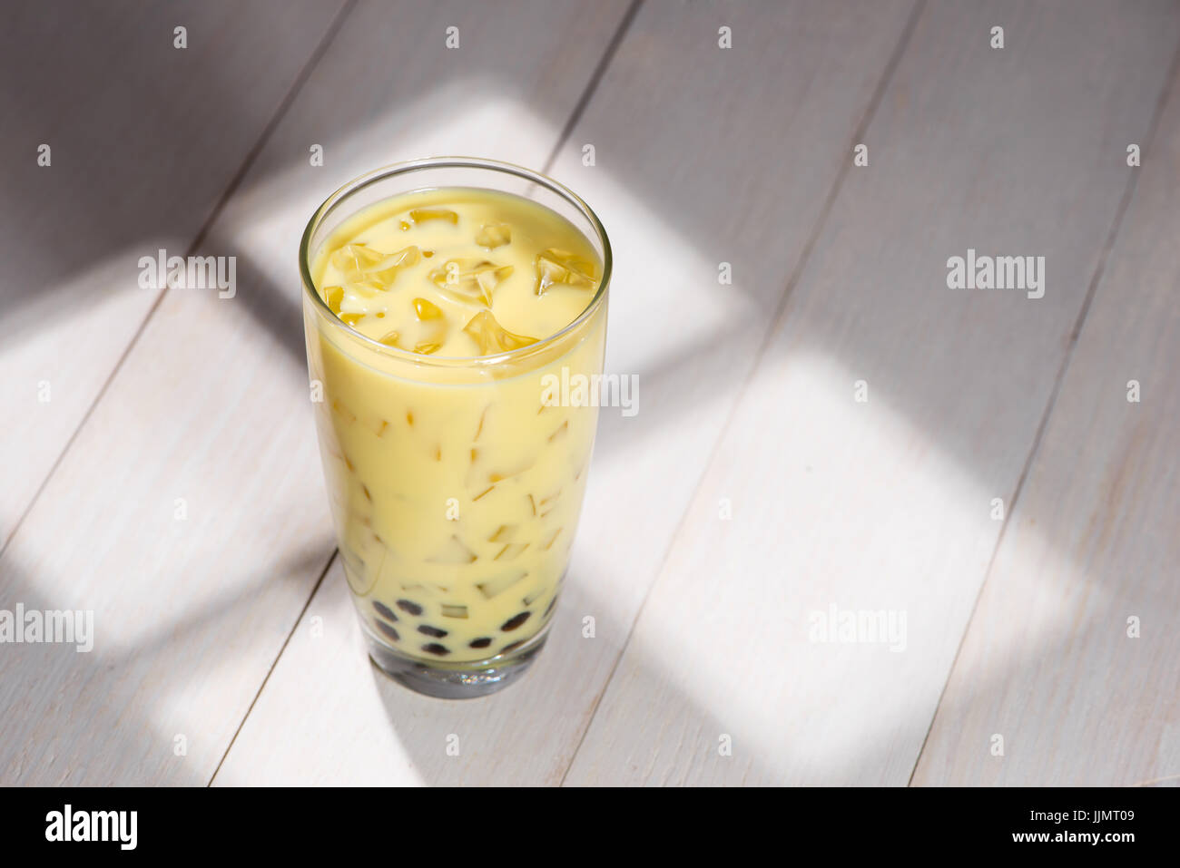 Boba / Bubble tea. Homemade Milk Tea with Pearls on wooden table Stock ...