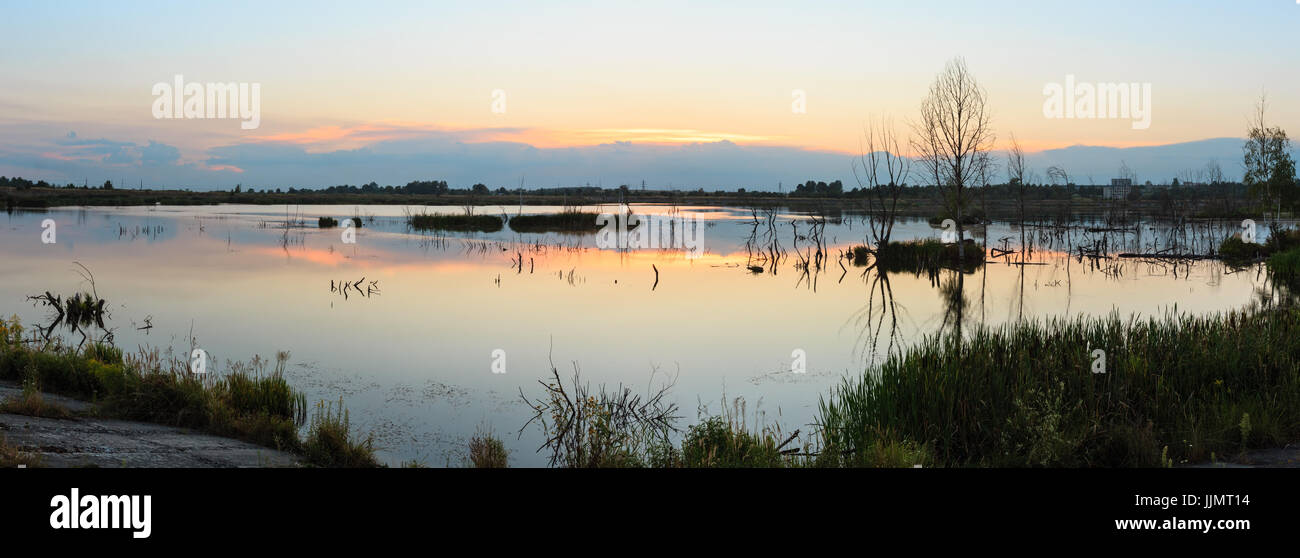 Sunset summer lake landscape with sun reflection on water surface (near ...