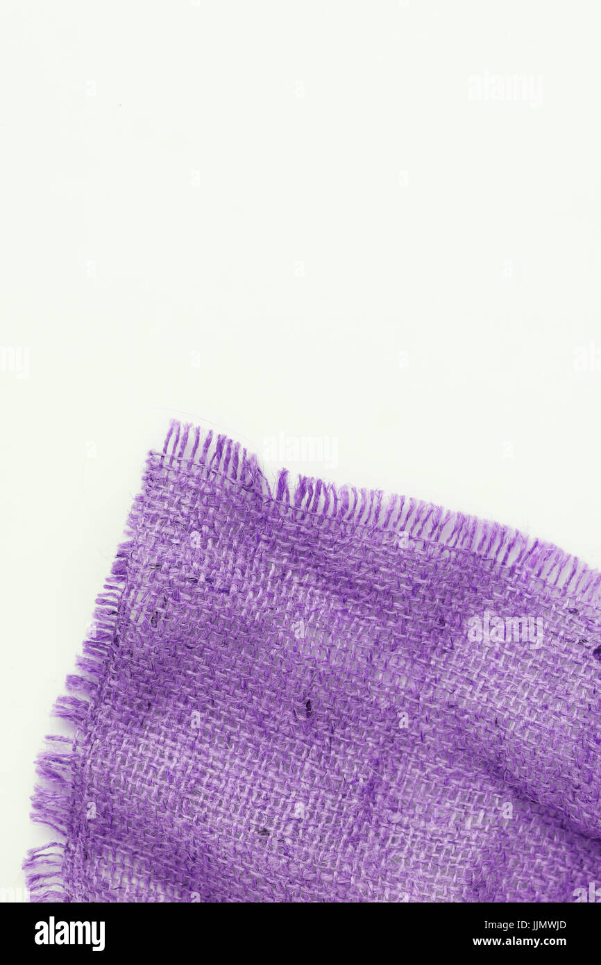 A piece of old burlap, isolated on a white background Stock Photo - Alamy